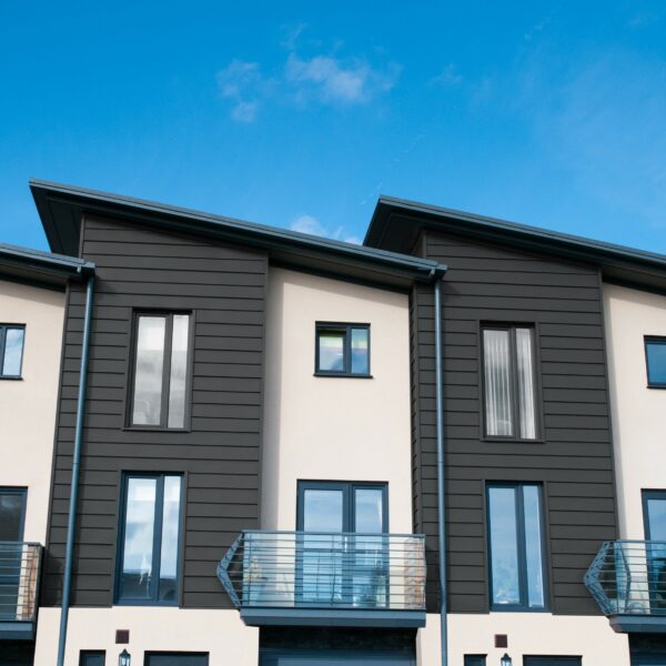 International Timber supplies Dura cladding for two floor extension ...